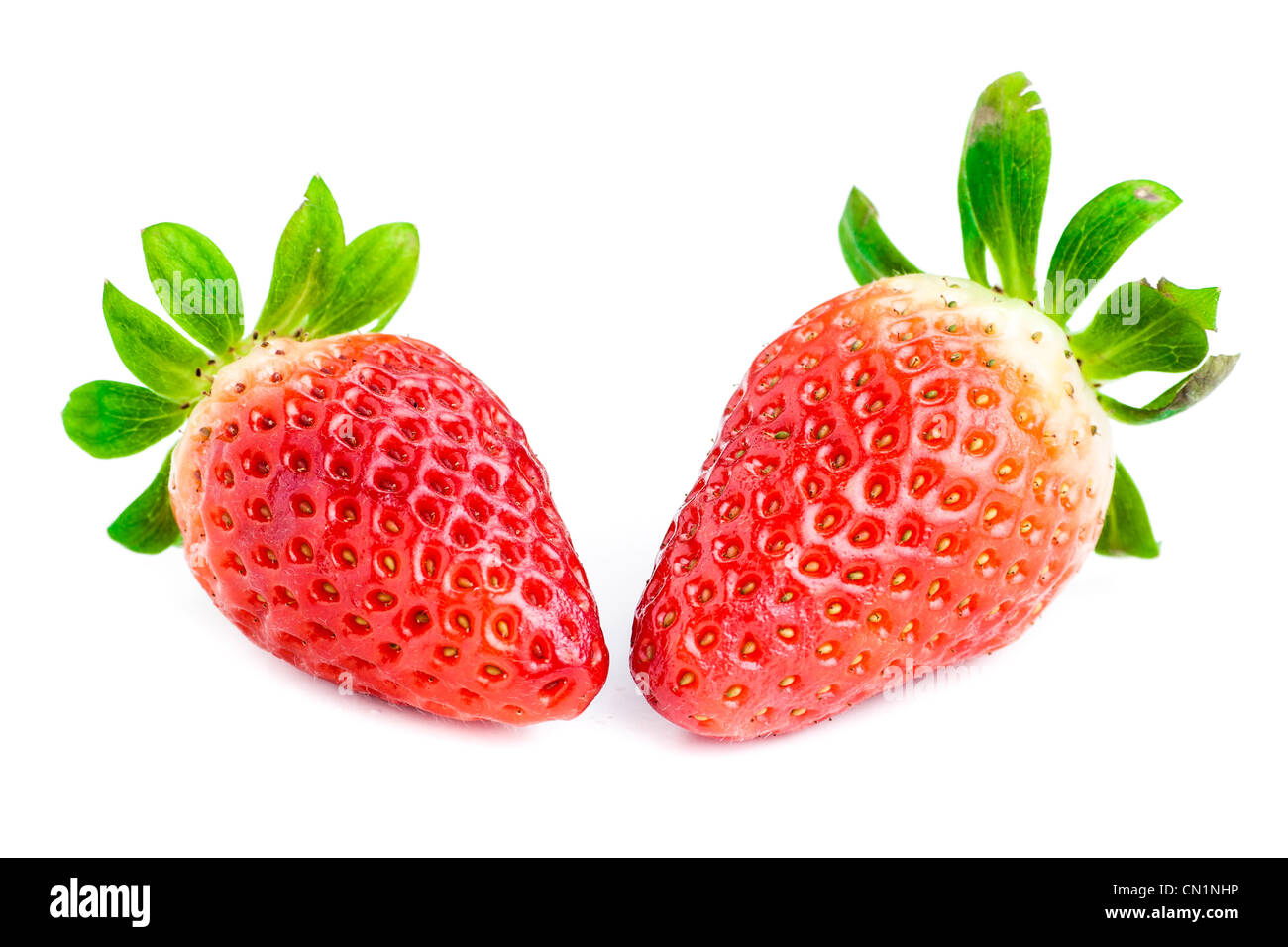 Strawberry fruits on a white background Stock Photo - Alamy
