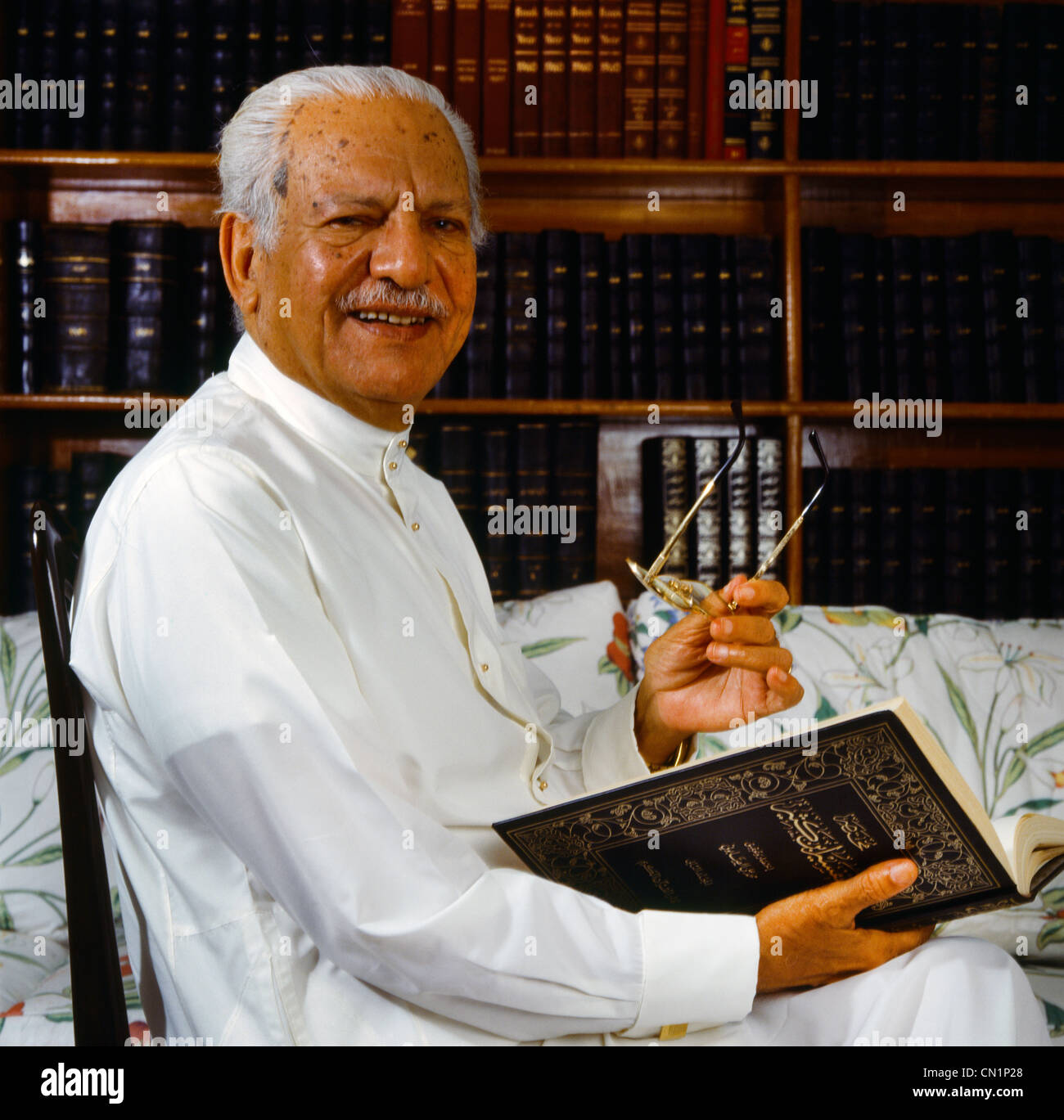 Saudi Arabia Old Man With Moustache Holding Book & Glasses Stock Photo ...