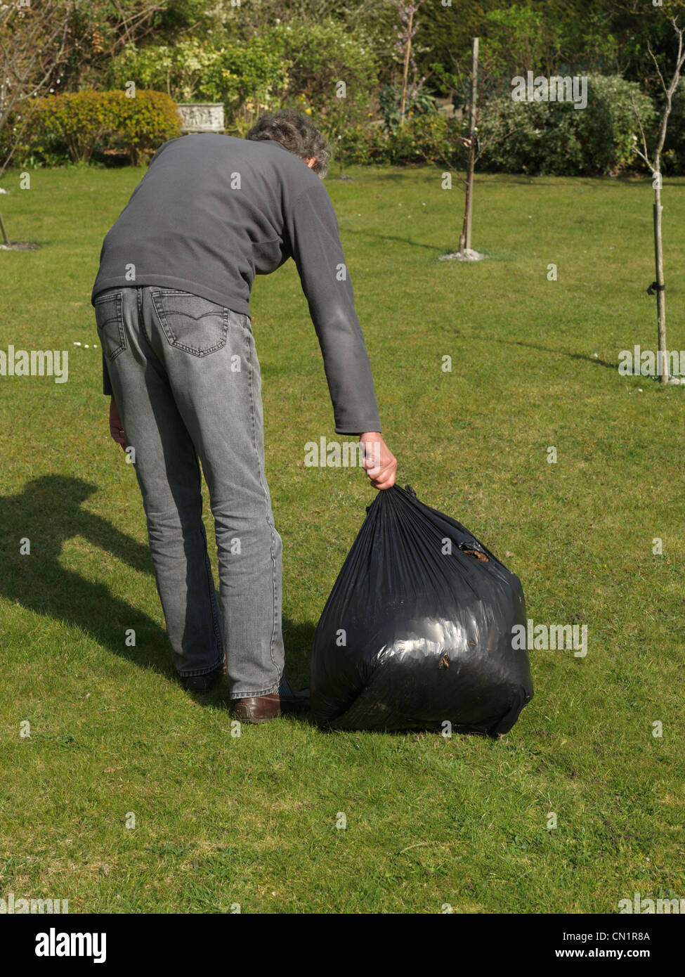 Dragging sack hi-res stock photography and images - Alamy