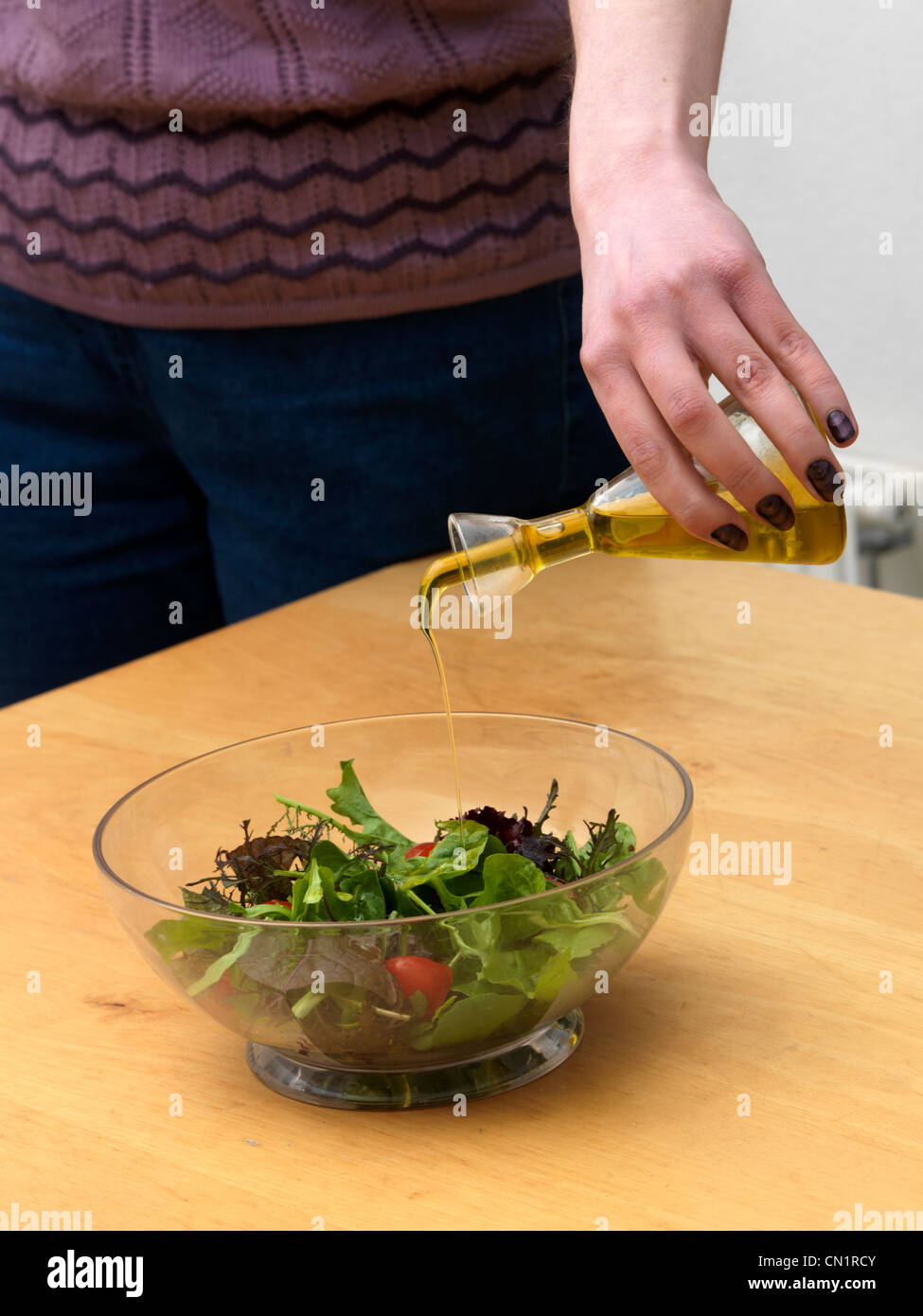 Drizzling olive oil hi-res stock photography and images - Alamy