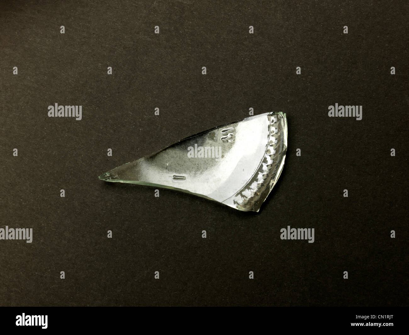A Sharp Piece Of Broken Glass Stock Photo - Alamy