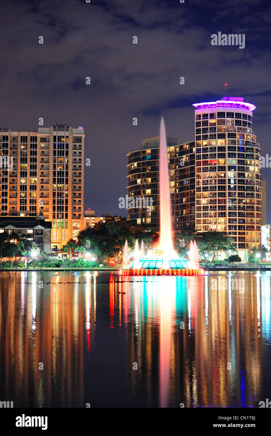Orlando downtown skyline over Lake Eola at dusk with urban skyscrapers ...