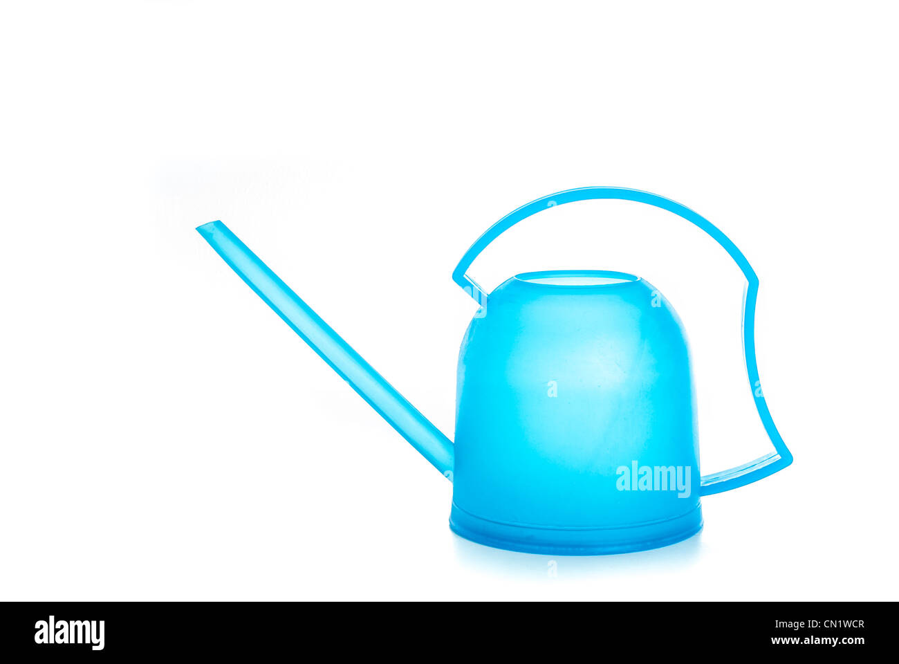 watering pot on a light background Stock Photo - Alamy