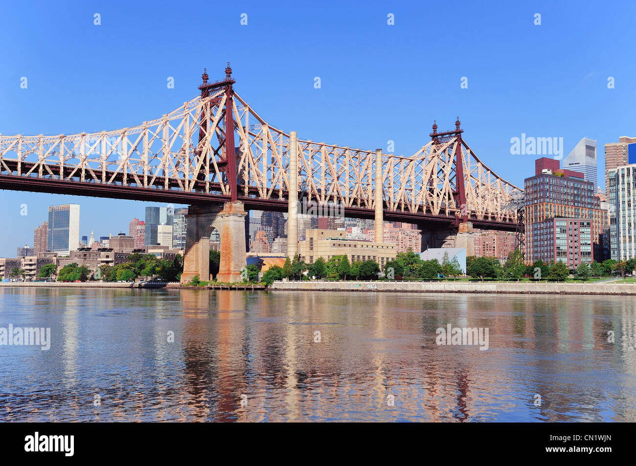Queensborough Bridge in Midtown Manhattan with New York City Stock ...