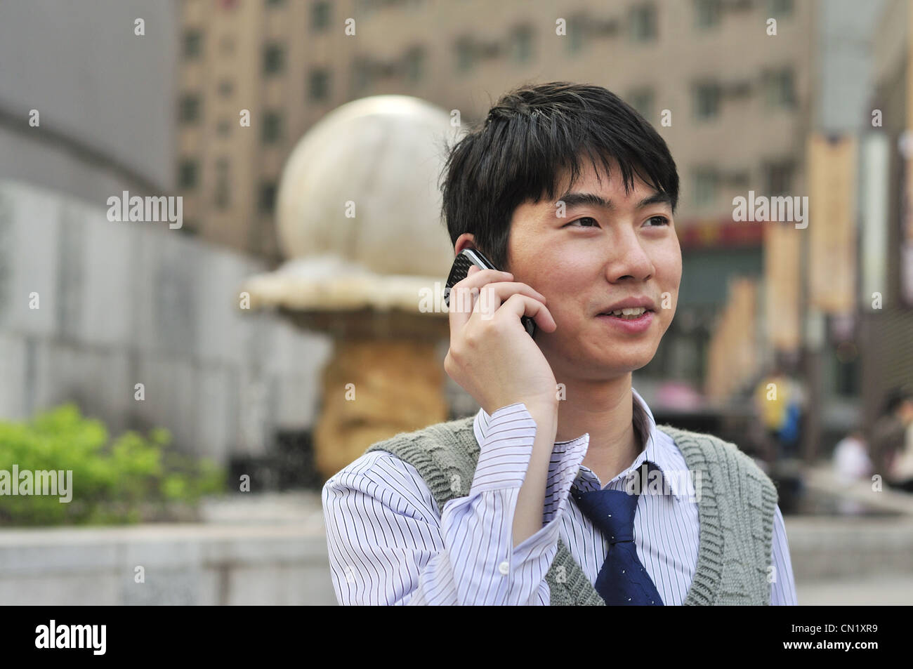 chinese young businessman using mobile phone,outdoors Stock Photo - Alamy chinese young businessman using mobile phone,outdoors Stock Photo - Alamy