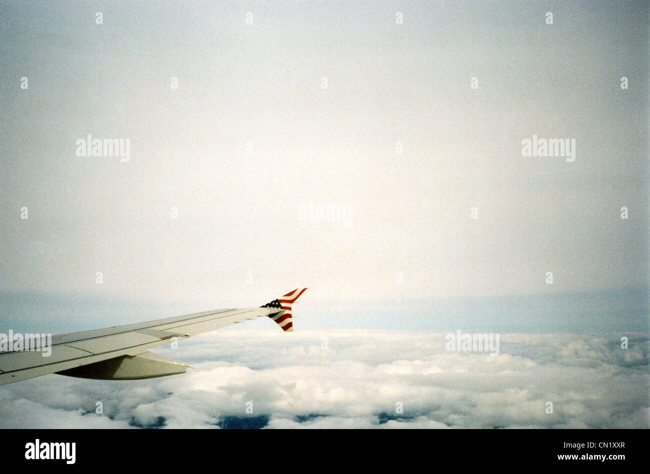 Airplane wing with US flag Stock Photo - Alamy