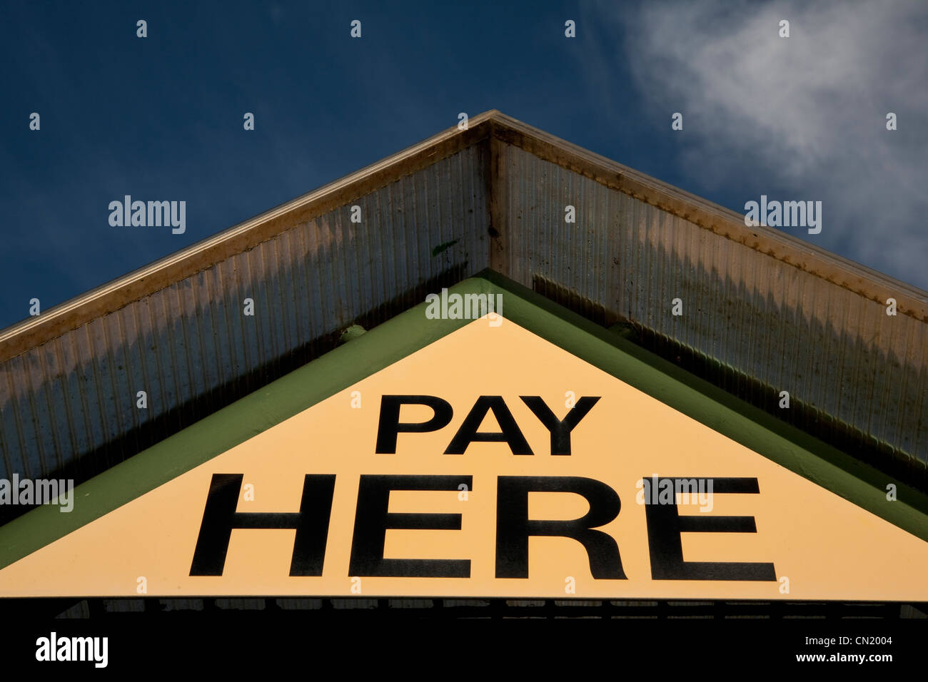 Yellow Payment Sign against Blue Sky Background Stock Photo - Alamy