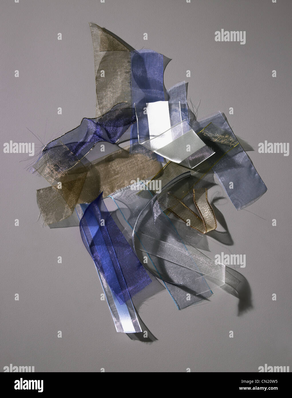 Pieces of fabric on grey background Stock Photo - Alamy