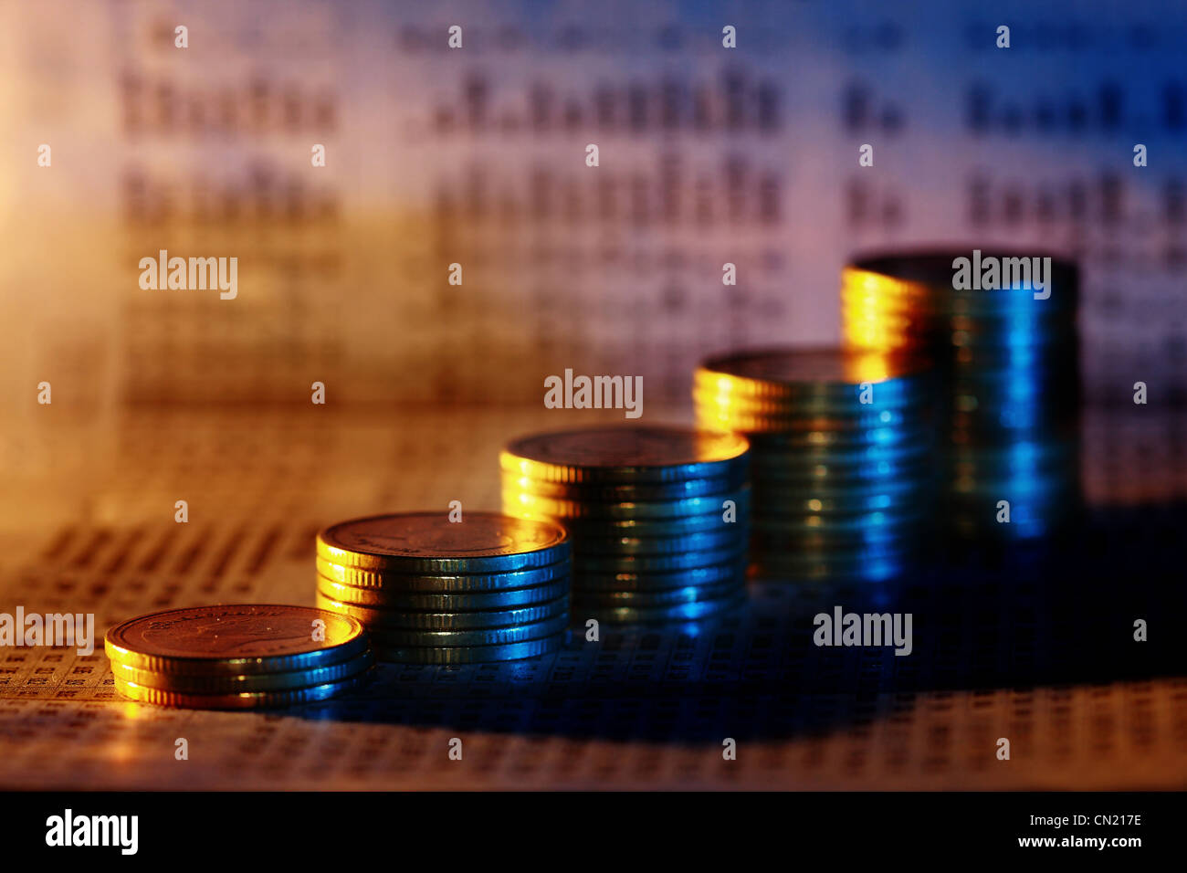 gold coin money with opposite color light Stock Photo - Alamy