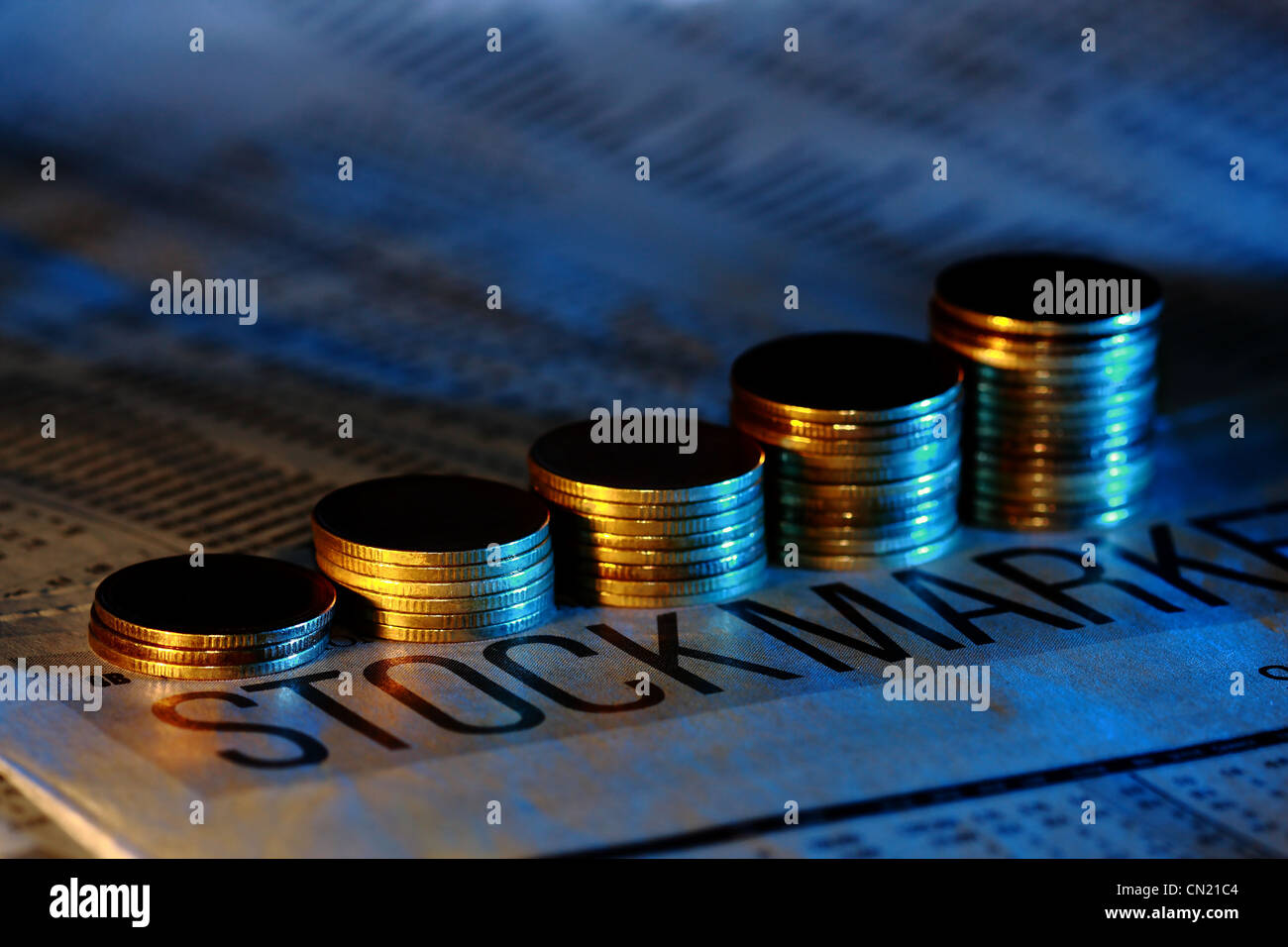 gold coin money with opposite color light Stock Photo - Alamy