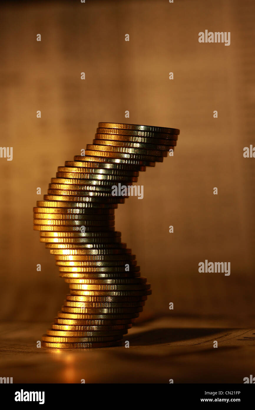 Gold coin unstable heap shape Stock Photo - Alamy