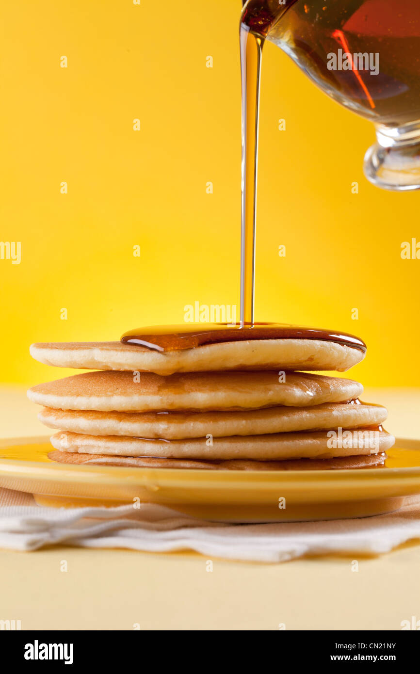 Pancake with butter and syrup Stock Photo - Alamy