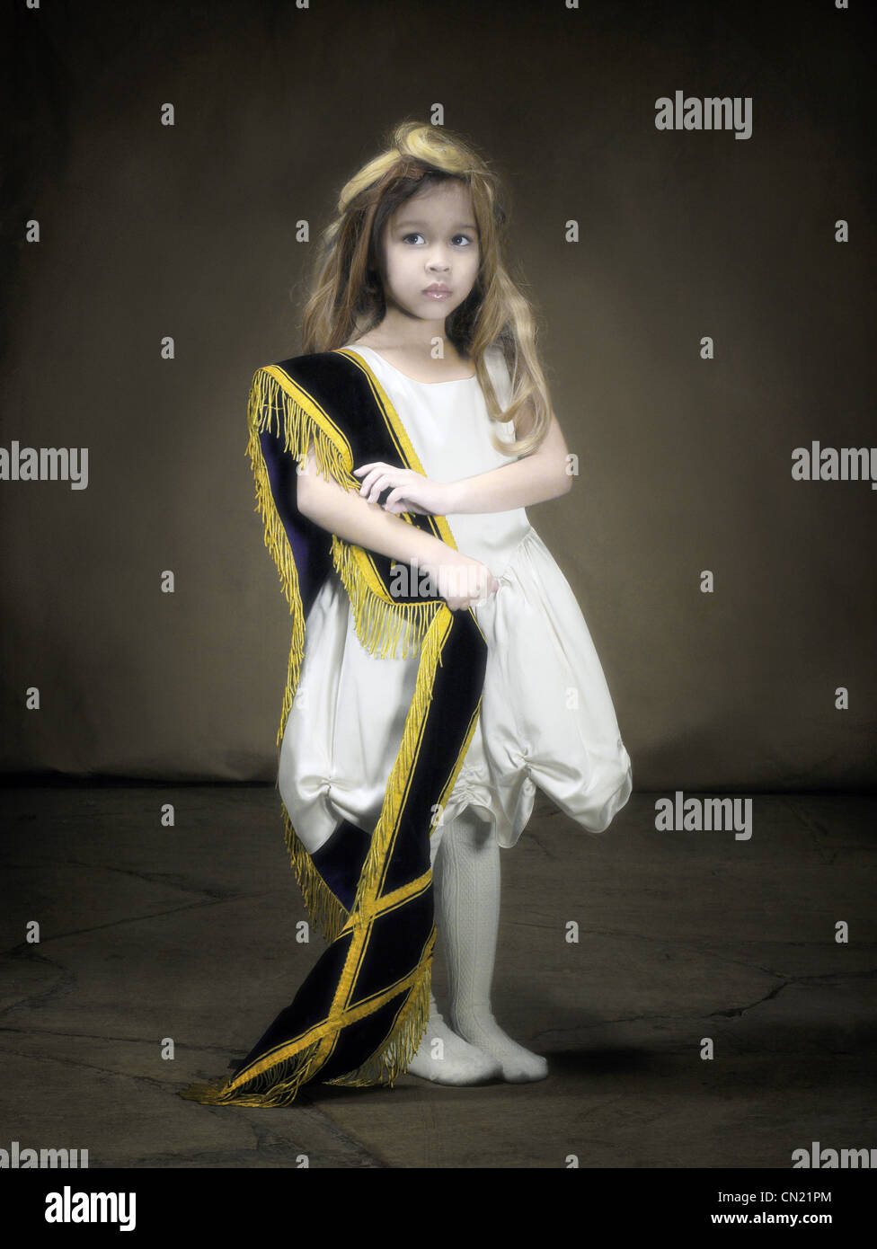 Young girl looking sad, wearing dress and sash Stock Photo - Alamy