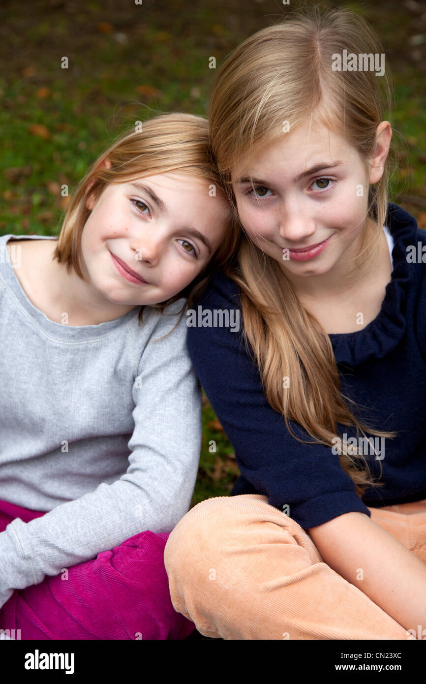 Two Smiling Girls Stock Photo - Alamy