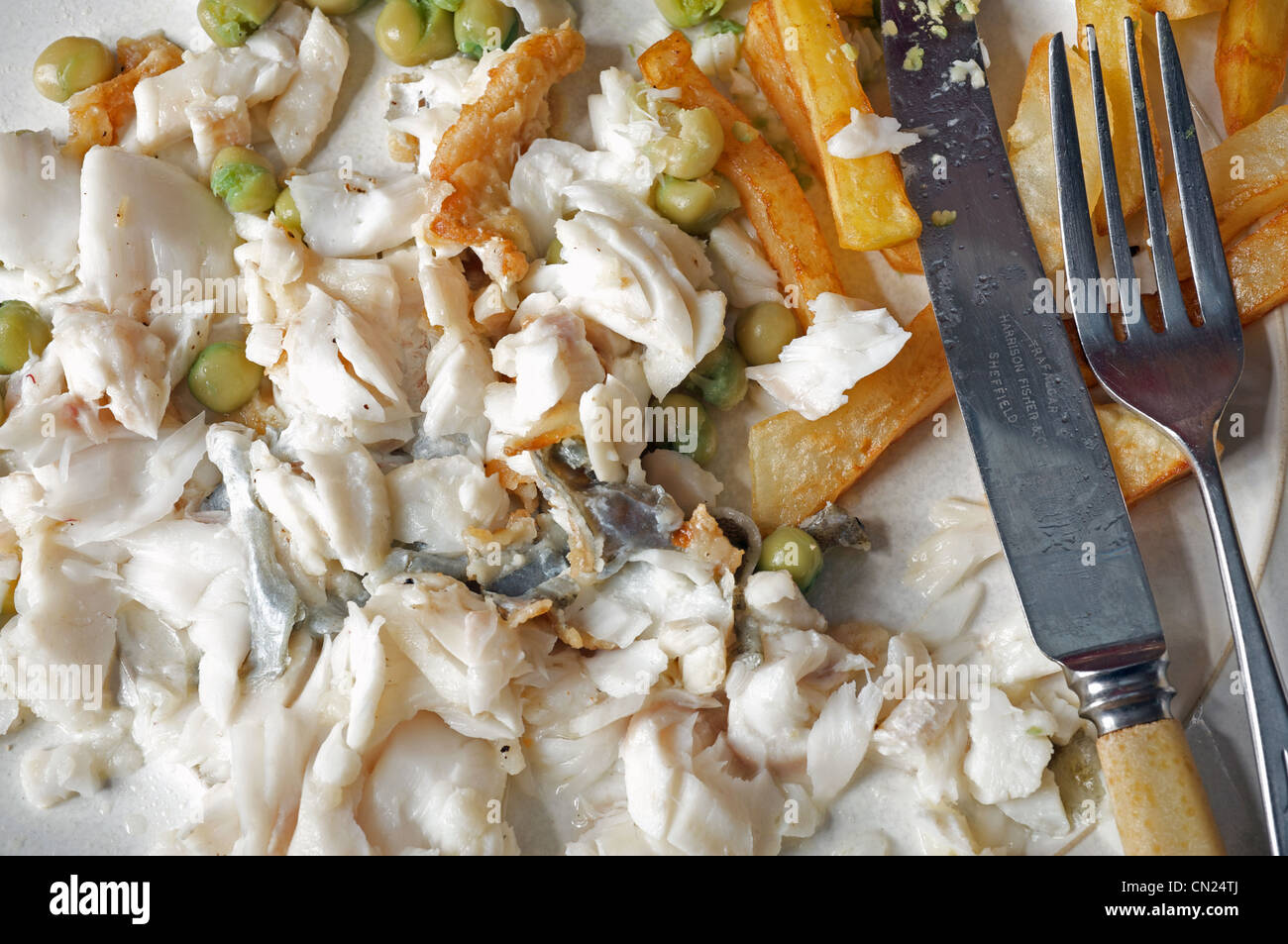 Fish and chips left-overs Stock Photo - Alamy