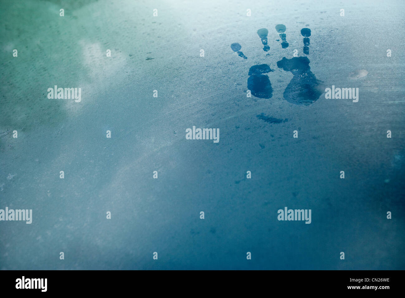 Handprint on car window Stock Photo - Alamy