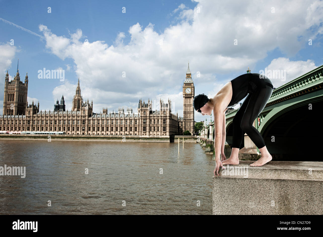 Swimmer diving off Westminster Bridge, London, England Stock Photo - Alamy