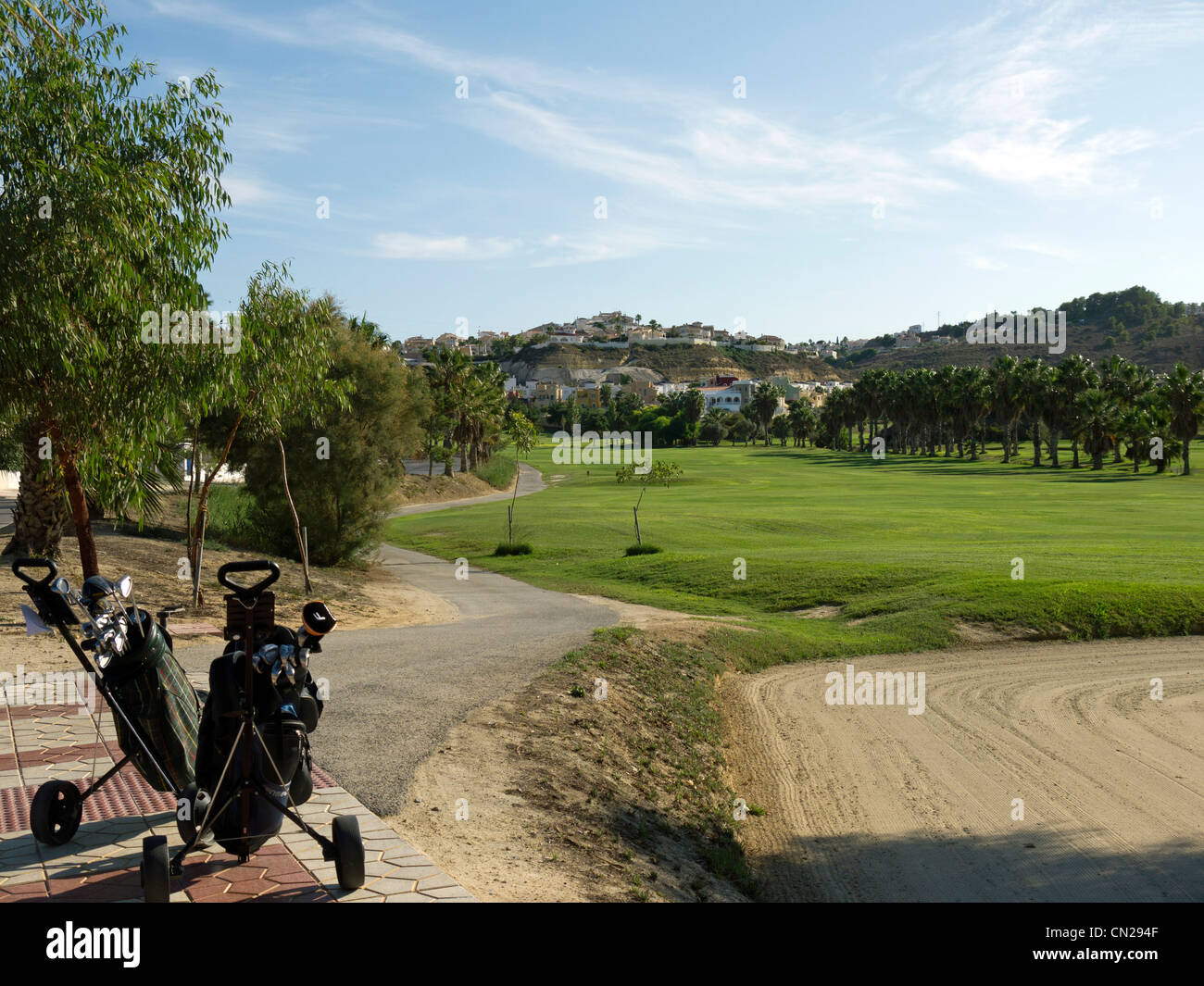 Golf trolleys by Golf course, Cuidad Quesada, Rojales, Spain Stock ...