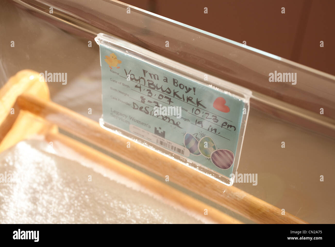 Hospital crib with label for baby boy Stock Photo - Alamy