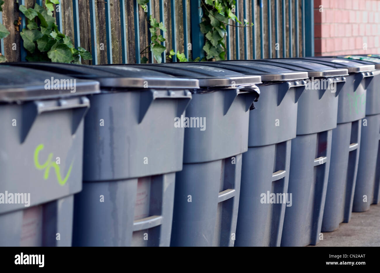 Row of Garbage Bins Stock Photo - Alamy