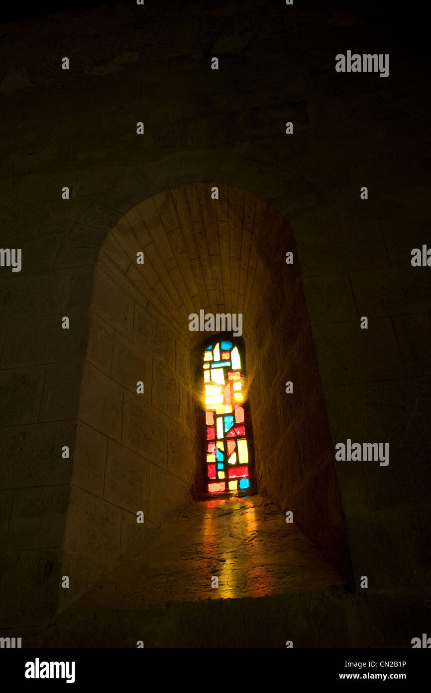Church in stained glass window hi-res stock photography and images - Alamy