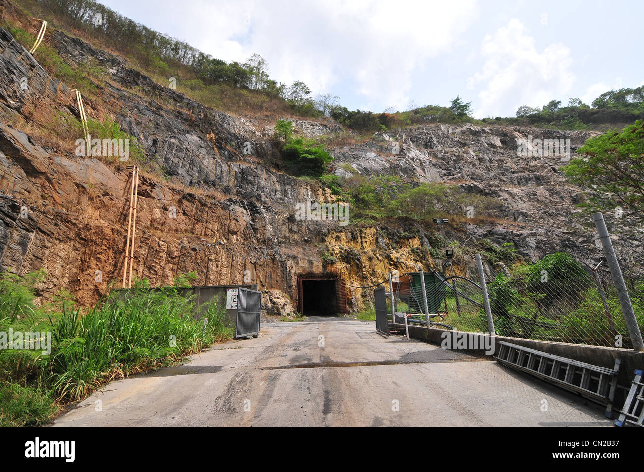 Ramp to enter an underground gold mine in Ghana, dug into the side of a ...