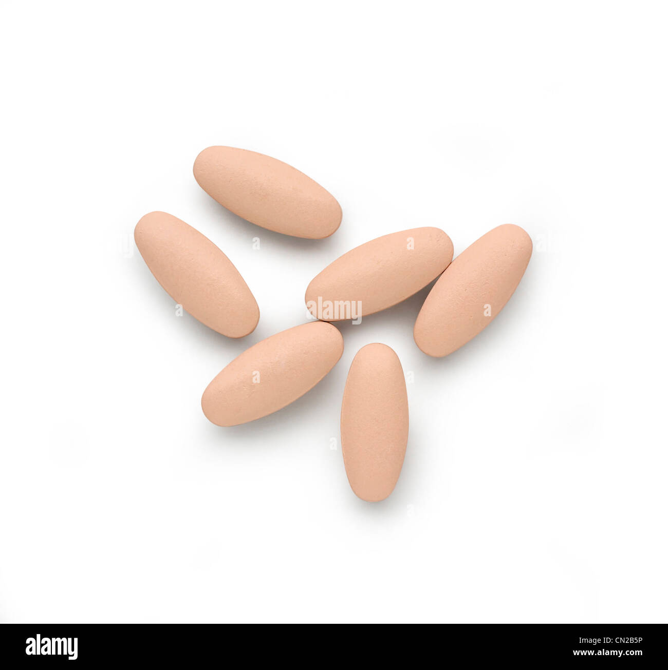 Group of six pills Stock Photo - Alamy