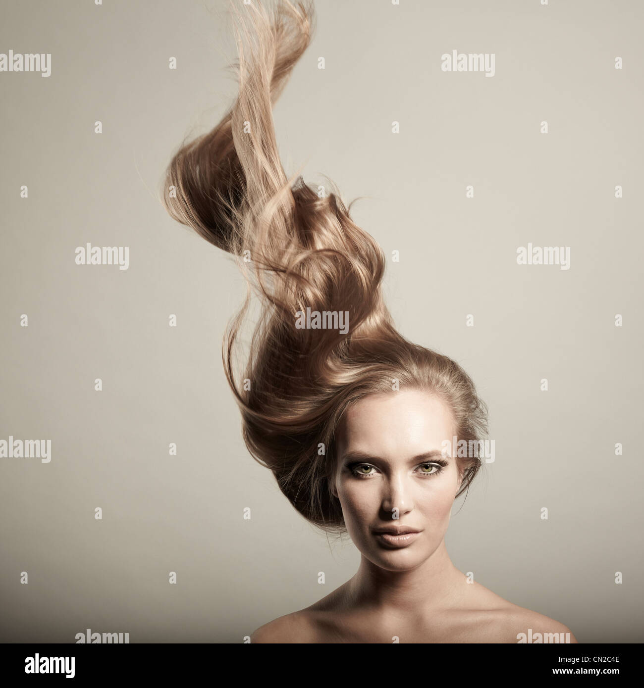 Photo of young beautiful woman with magnificent hair Stock Photo - Alamy