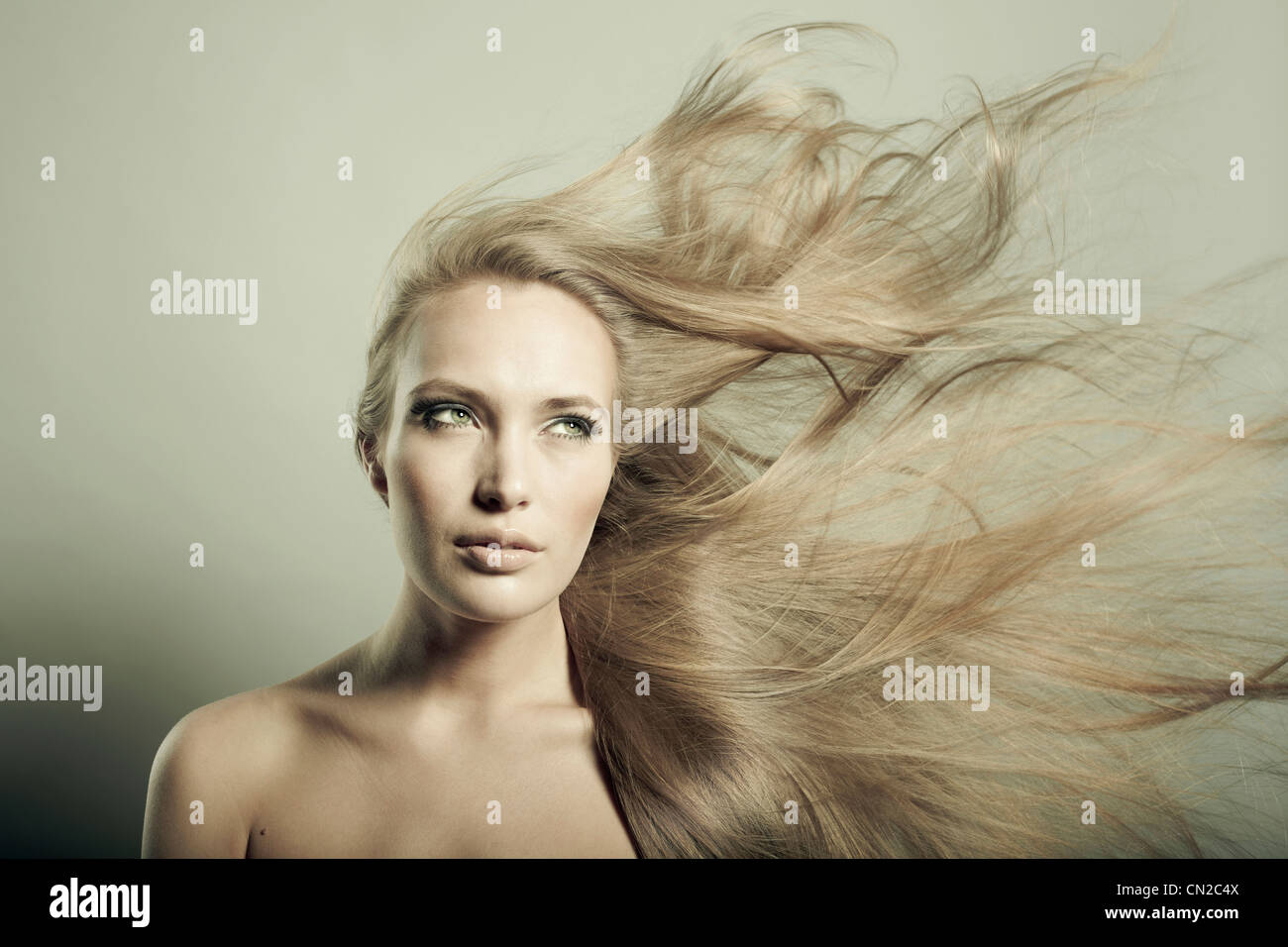 Photo of young beautiful woman with magnificent hair Stock Photo - Alamy