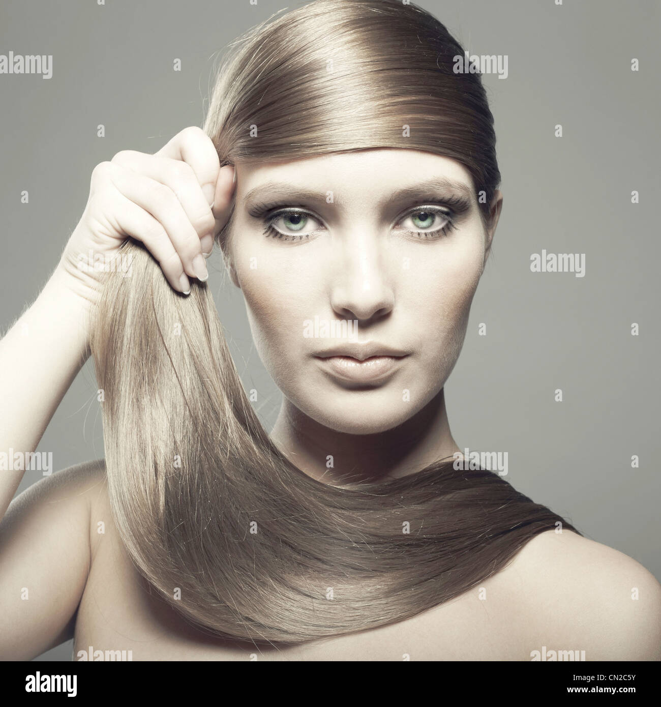 Photo of young beautiful woman with magnificent hair Stock Photo - Alamy