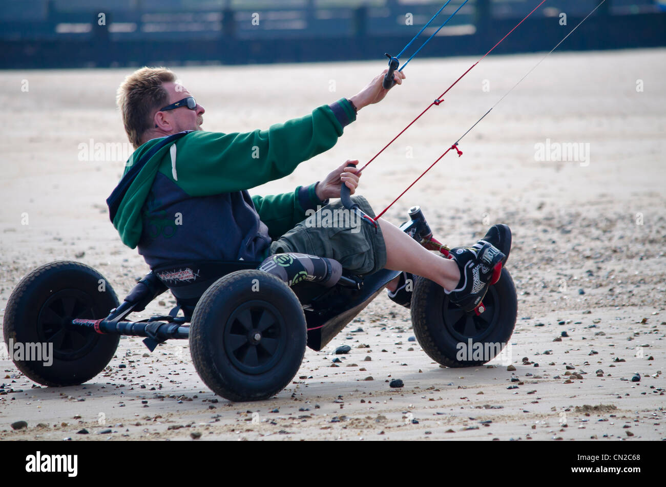 windsurfing along the beach Stock Photo - Alamy