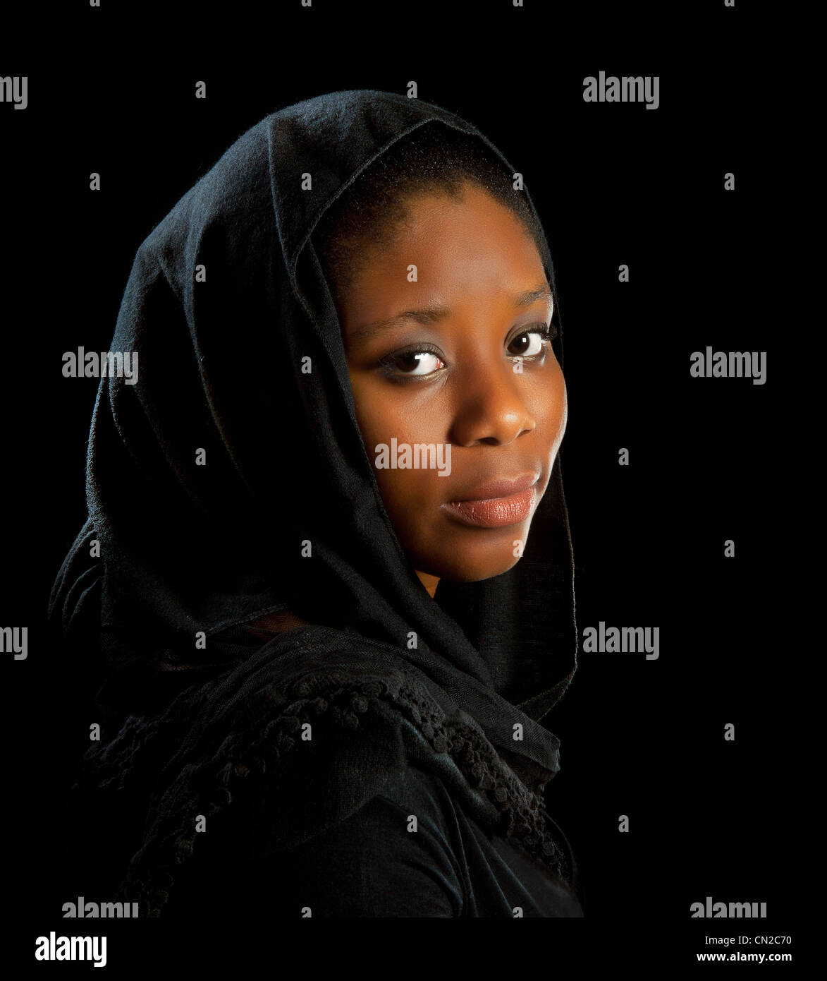 Beautiful African Ghanese woman in melancholic mood Stock Photo - Alamy