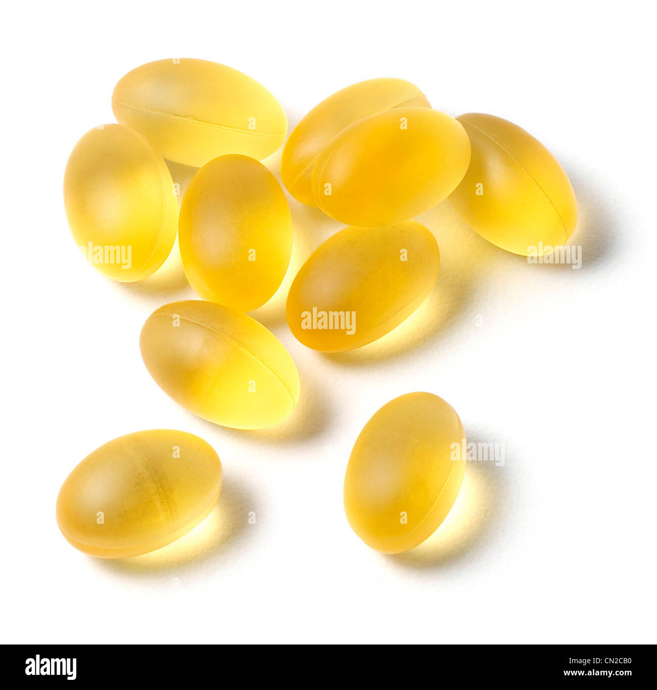 Yellow vitamin capsules Stock Photo - Alamy