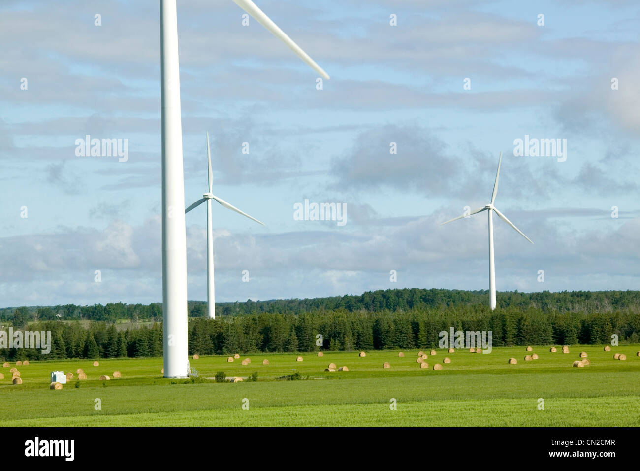 Wind Turbines and Hay Bales in Field, Near Dundalk, Ontario Stock Photo ...