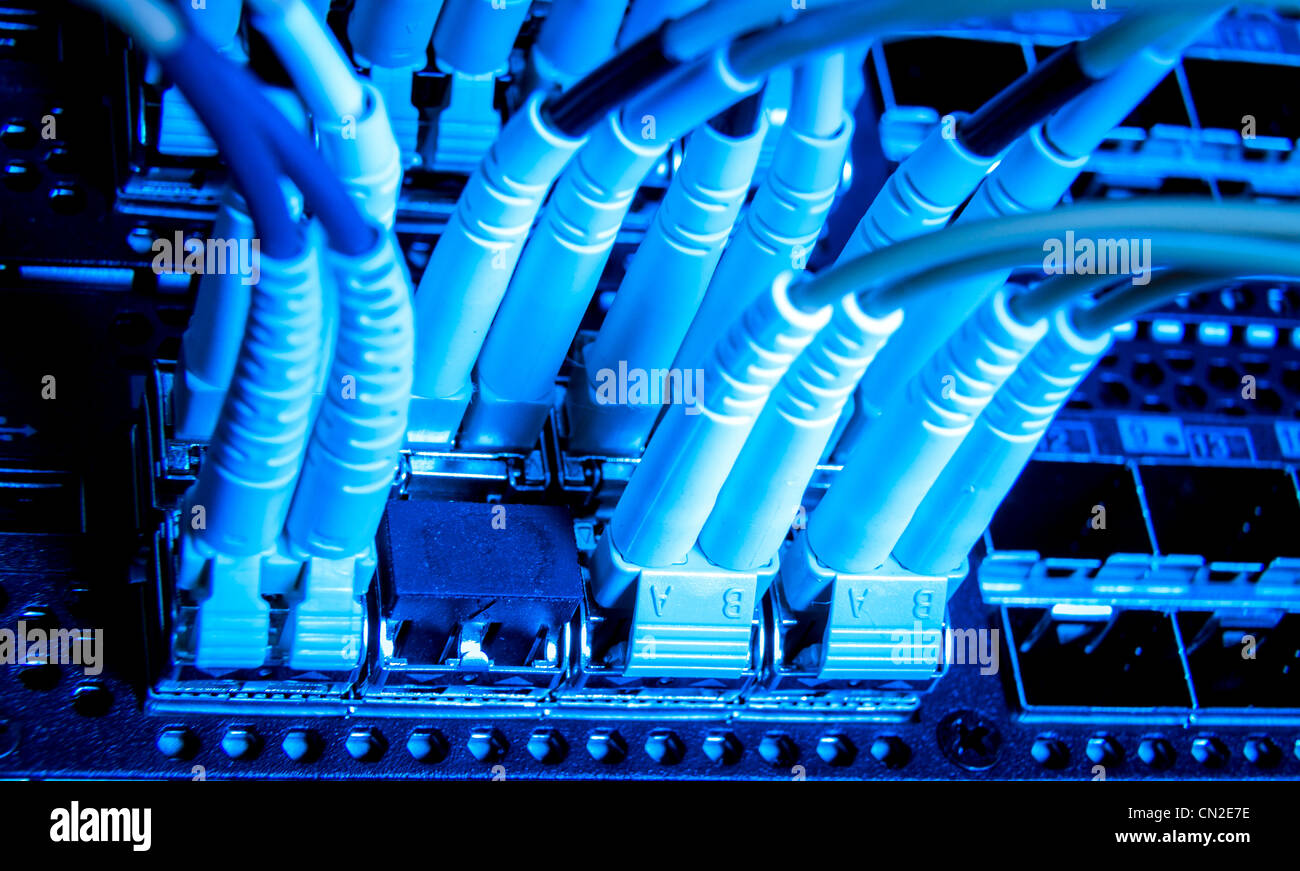 optic fiber cables connected to data center Stock Photo - Alamy