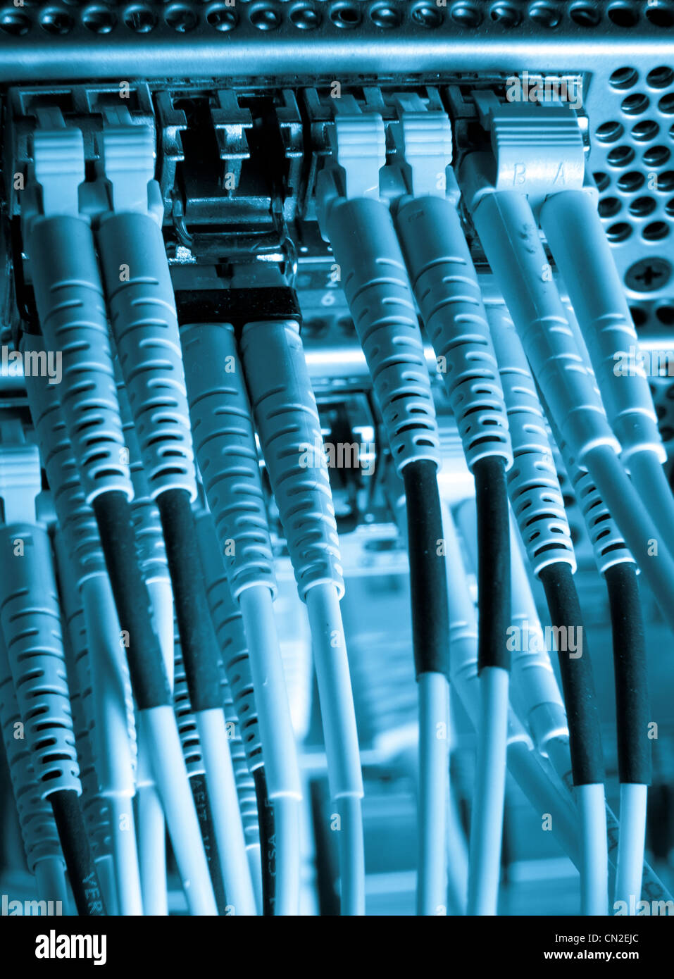 optic fiber cables connected to hub Stock Photo - Alamy