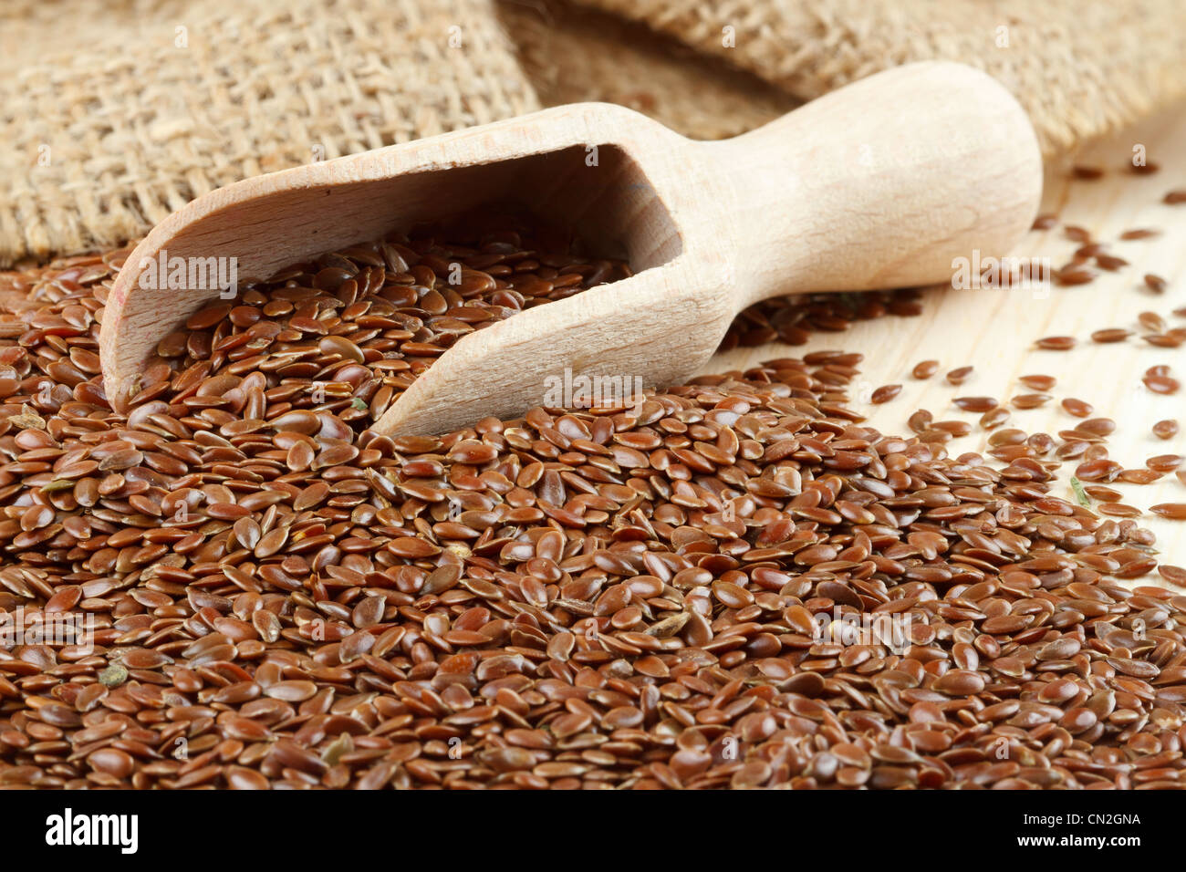 linseed, flax seeds, wooden scoop, sacking bag Stock Photo - Alamy