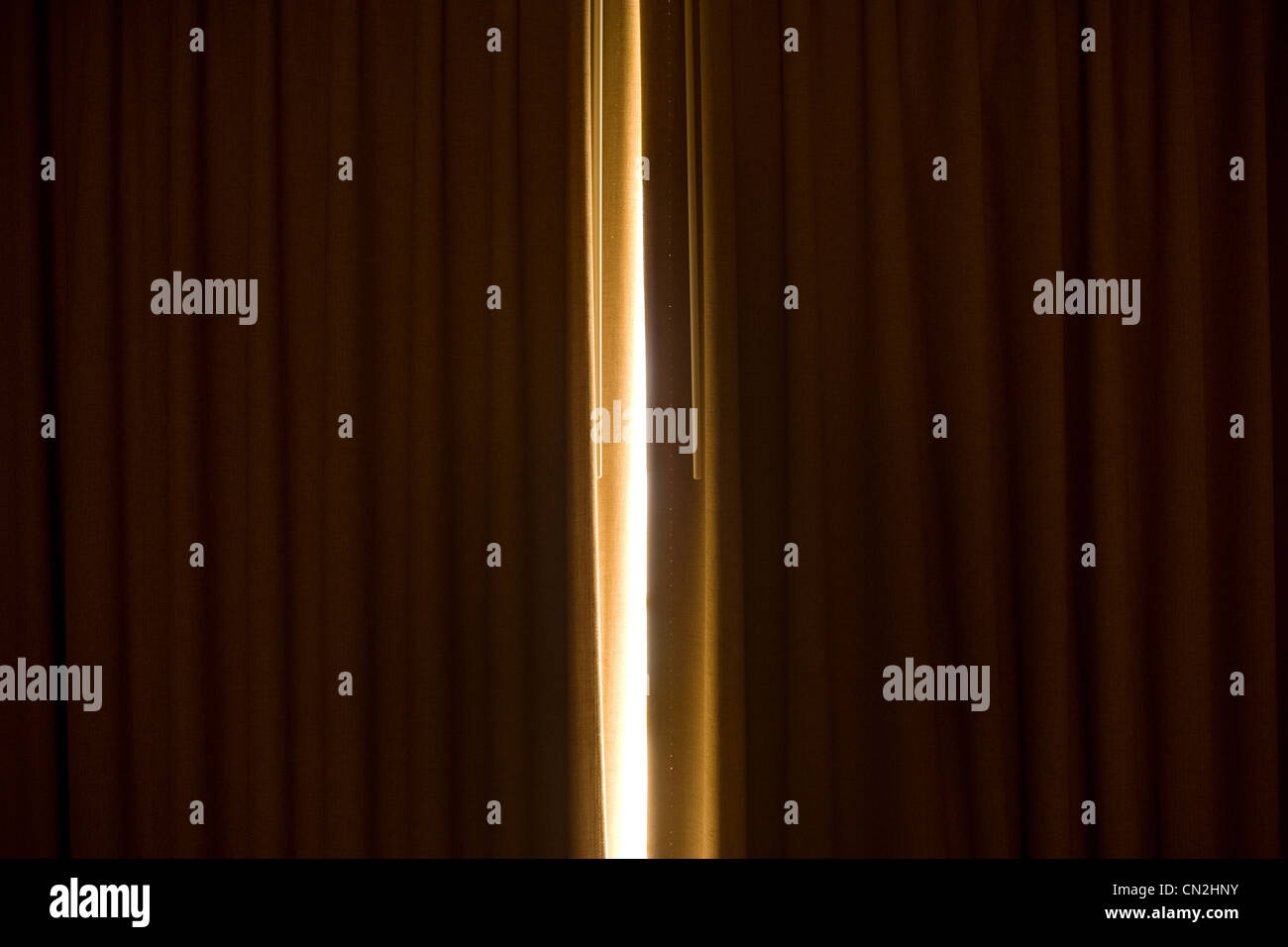 Gap in curtain Stock Photo - Alamy