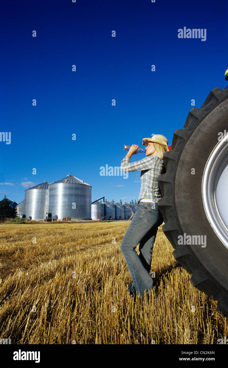 Girl drinking water farm hi-res stock photography and images - Alamy