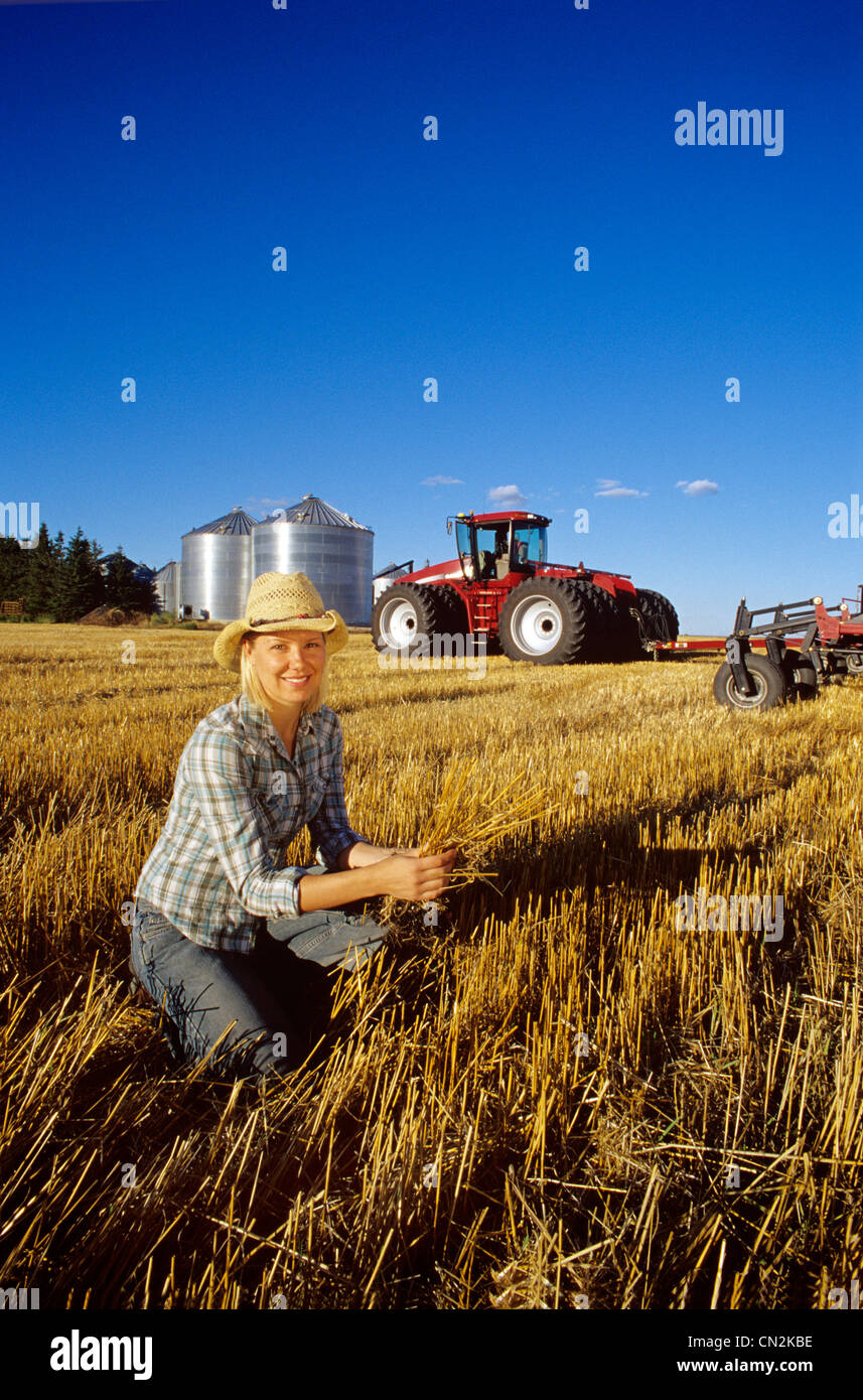 Farm Girl with Wheat Stubble, Dugald, Manitoba Stock Photo - Alamy