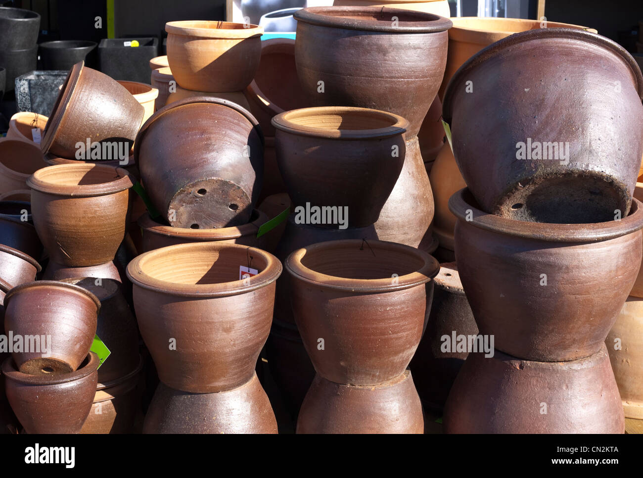 stack of stoneware pots ready for sale Stock Photo - Alamy