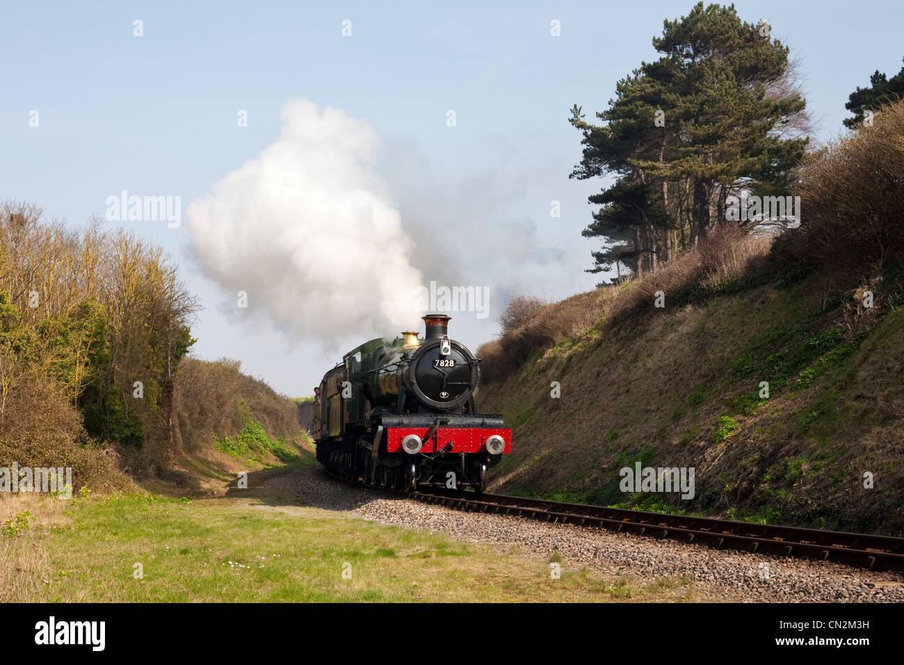 steam train approaching watchet station in somerset Stock Photo - Alamy