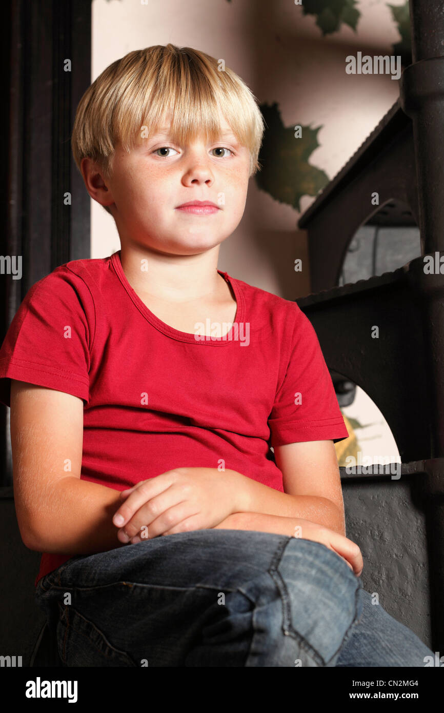 blonde boy in red Stock Photo - Alamy
