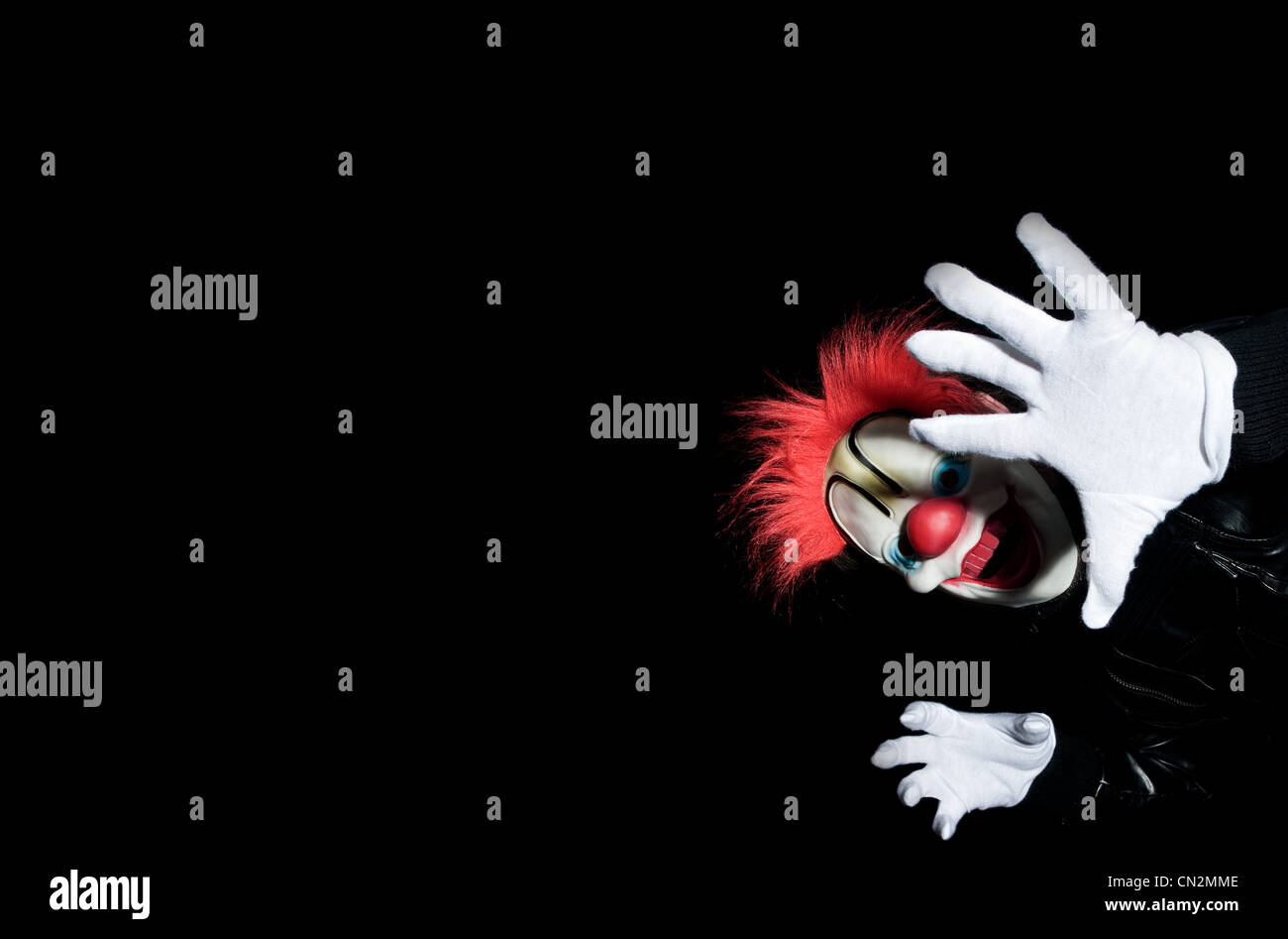 Person in clown costume Stock Photo - Alamy