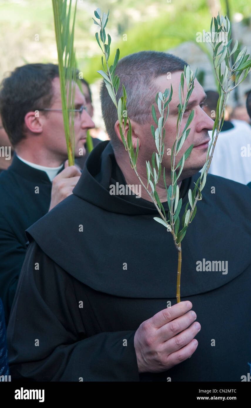 Unidentified monk take part in the Palm Sunday procession in Jerusalem ...