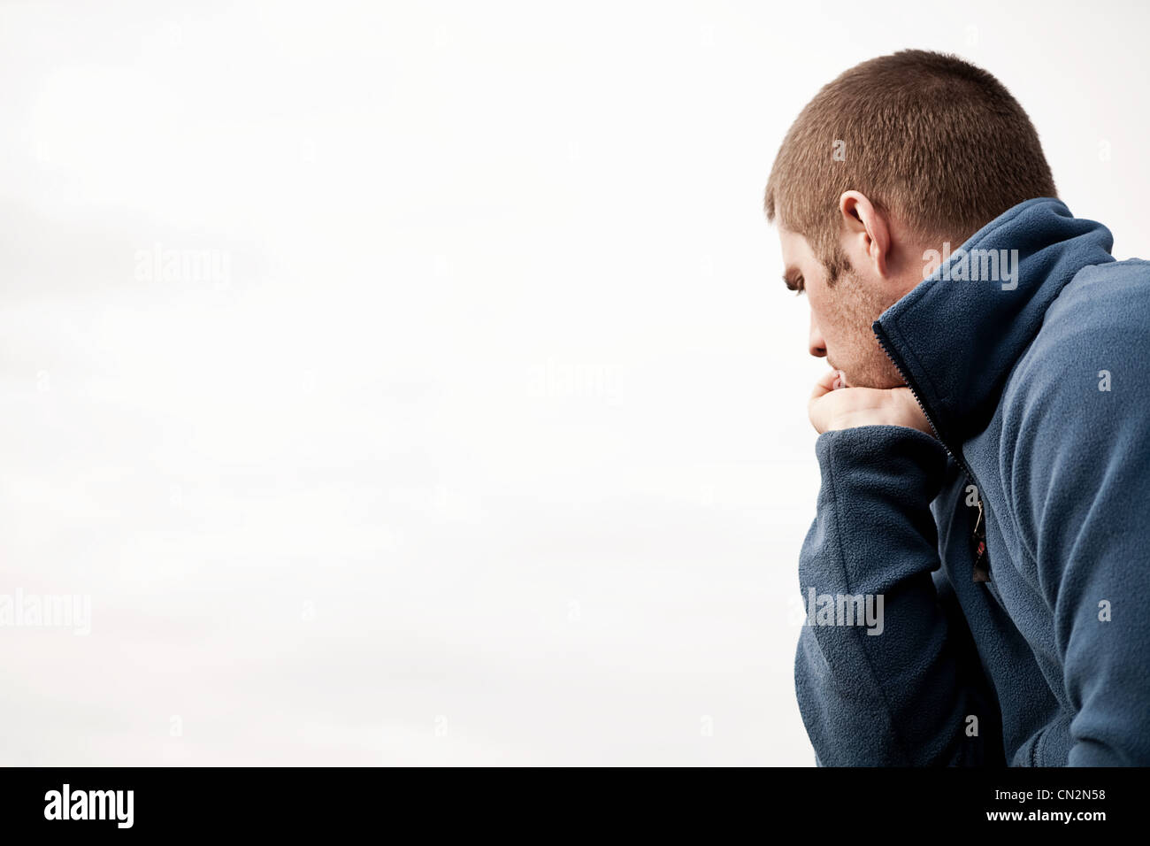 Contemplative young man Stock Photo - Alamy Contemplative young man Stock Photo - Alamy