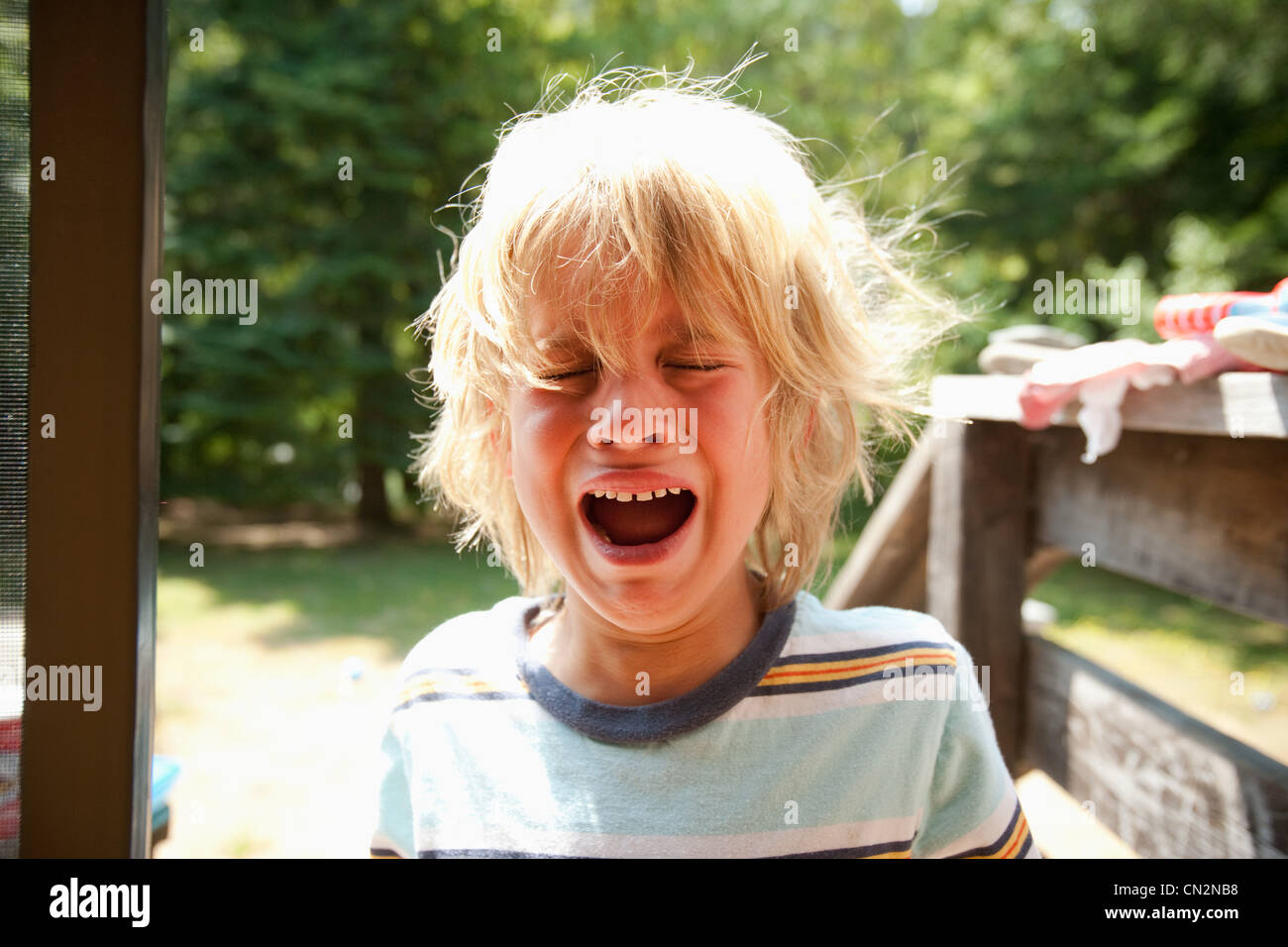 Young boy crying Stock Photo - Alamy