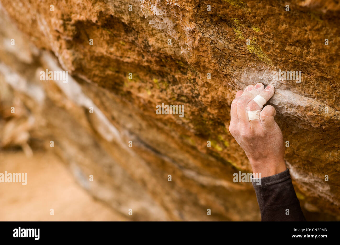 Mans Hand Clinging to Rock while Climbing Stock Photo - Alamy