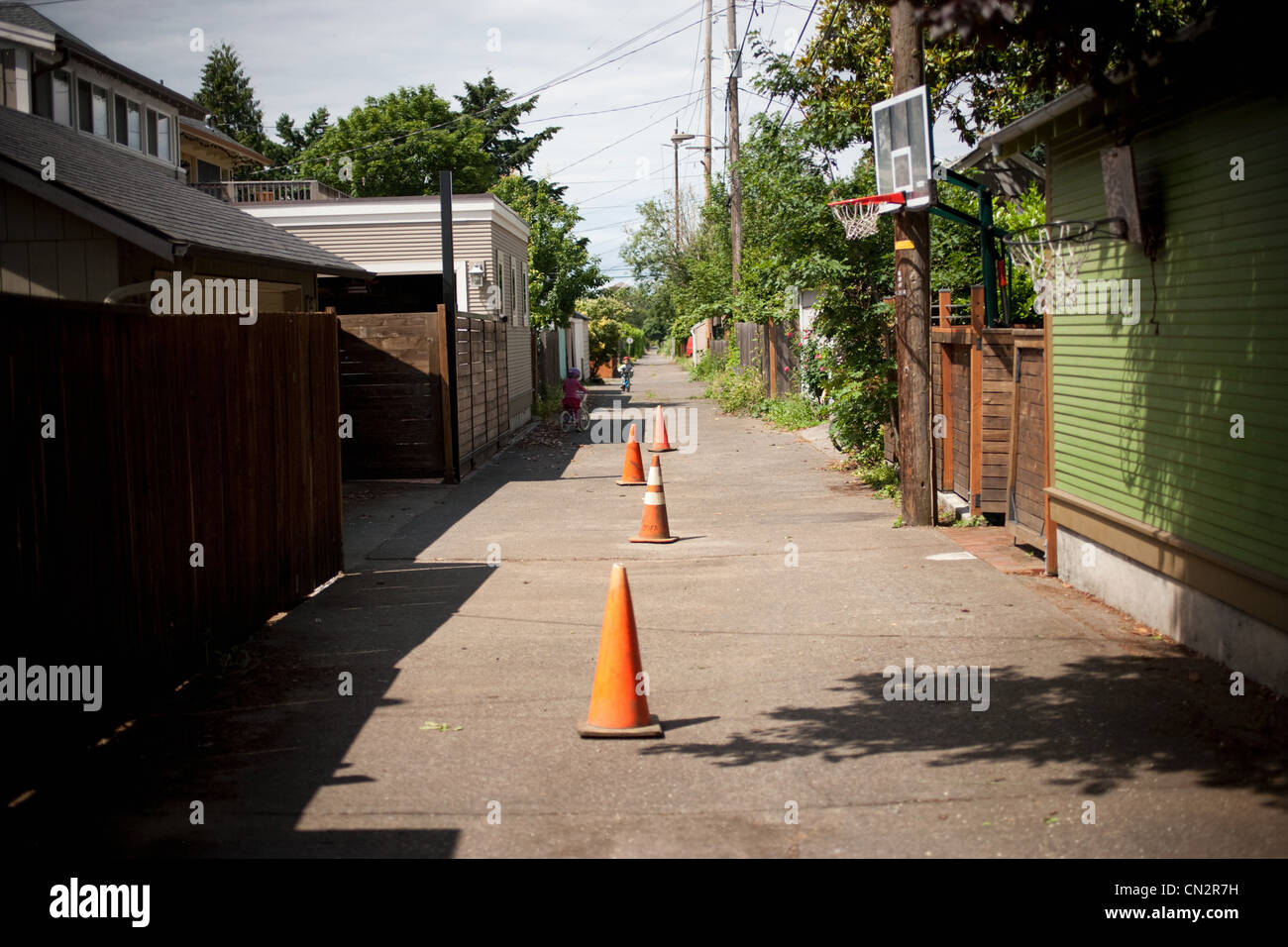Traffic cones in alley Stock Photo - Alamy