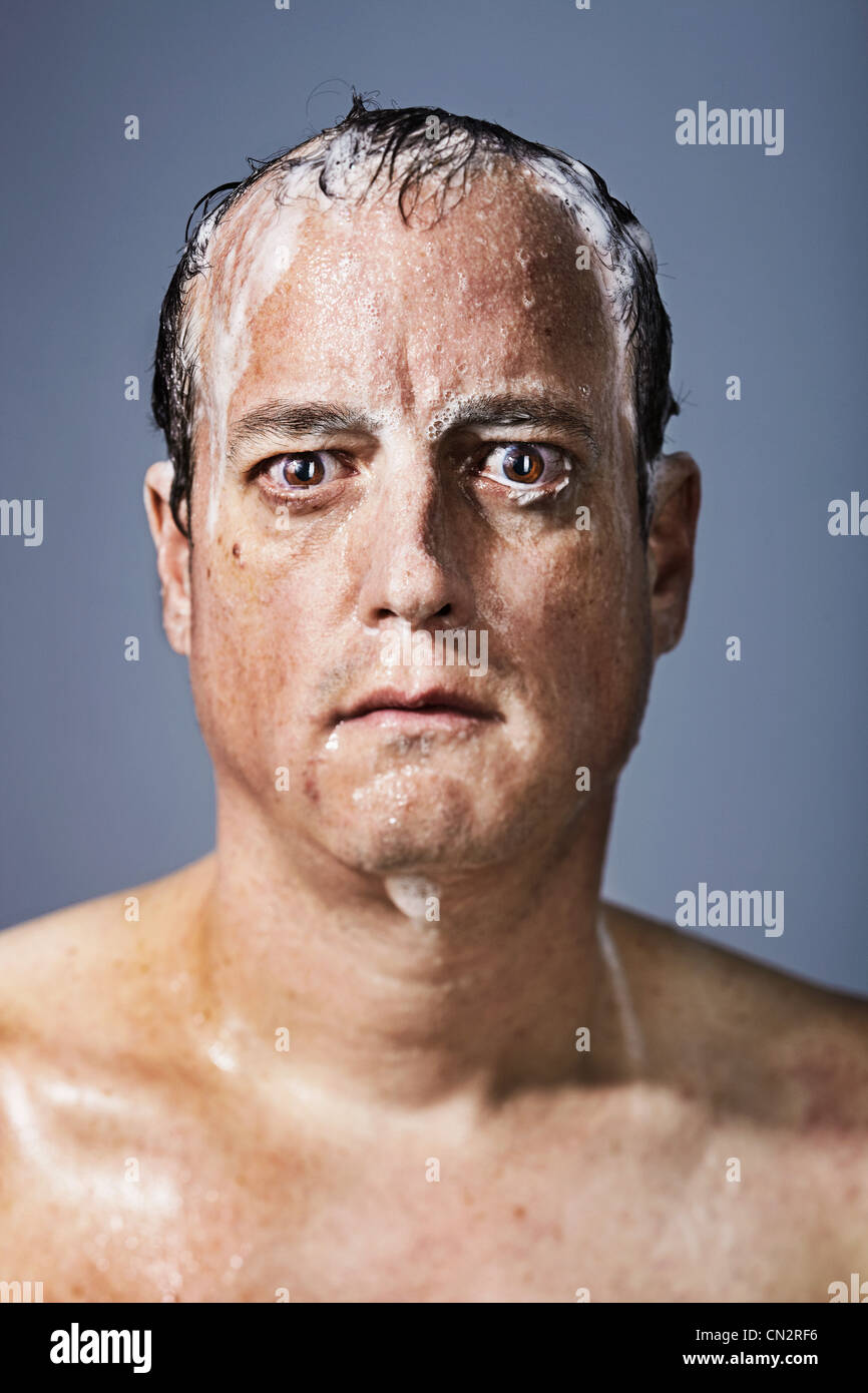 Portrait of a man with soap on his face Stock Photo - Alamy